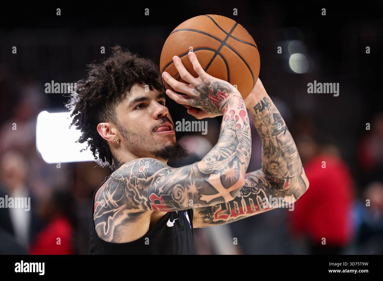 Charlotte Hornets guard LaMelo Ball shoots during pregame warmups ...