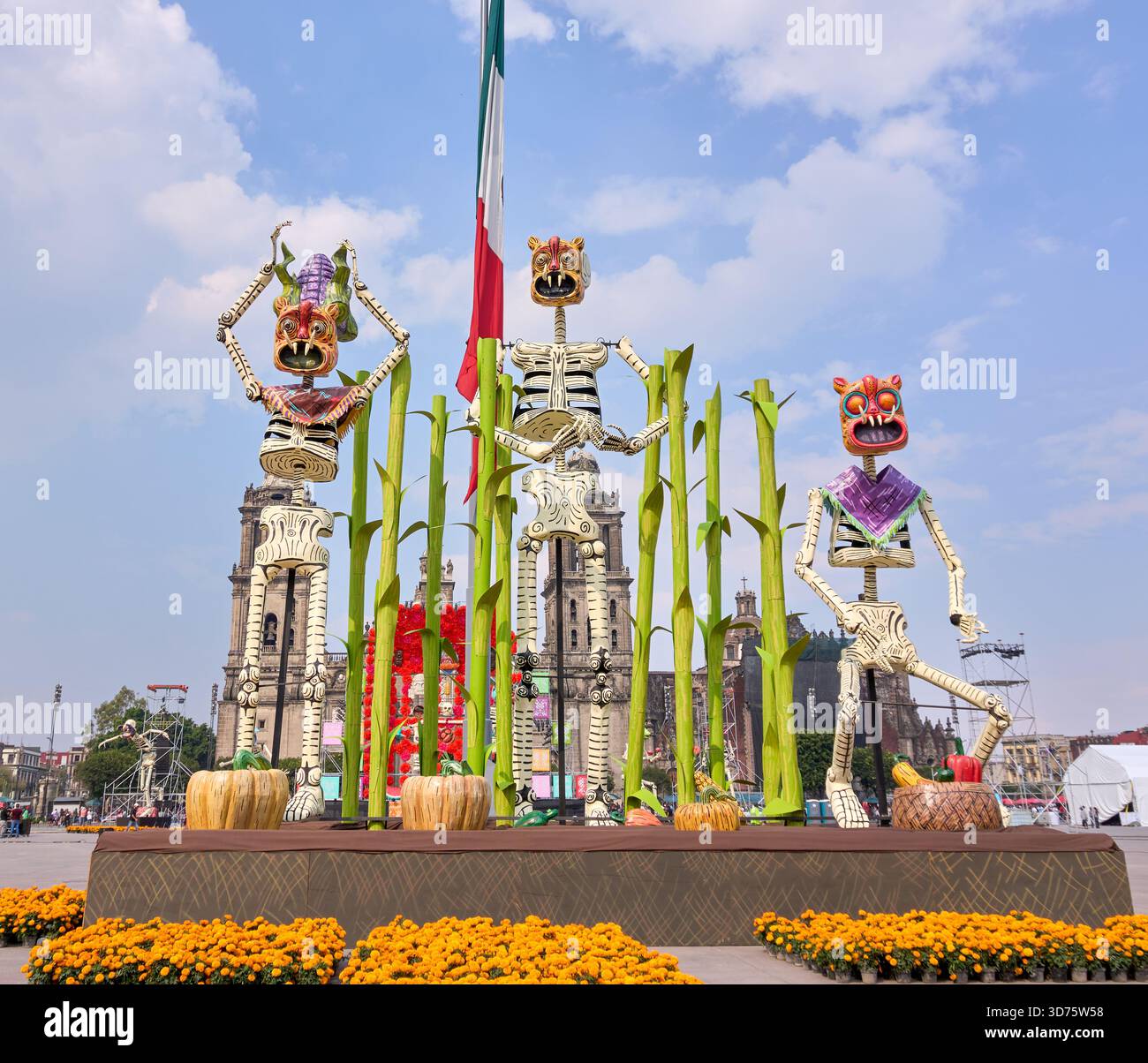 A large skeleton statue is surrounded by bamboo and is part of a ...