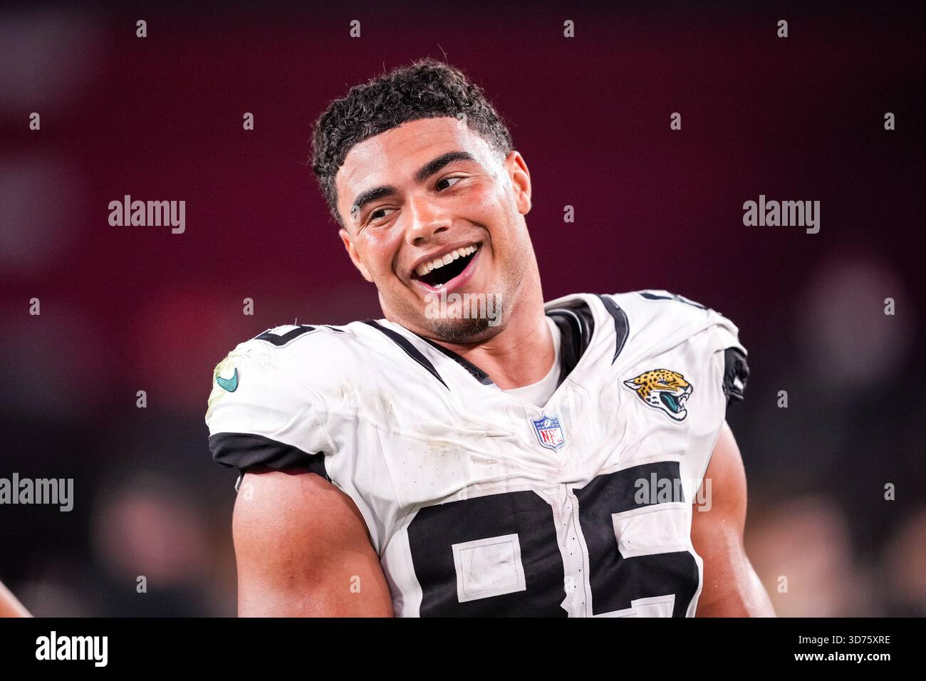 Jacksonville Jaguars tight end Brenton Strange (85) smiles after an NFL ...