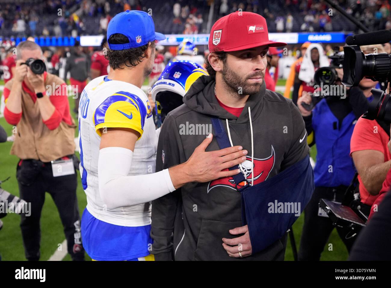Los Angeles Rams quarterback Matthew Stafford (9) greets Tampa Bay Buccaneers quarterback Baker ...