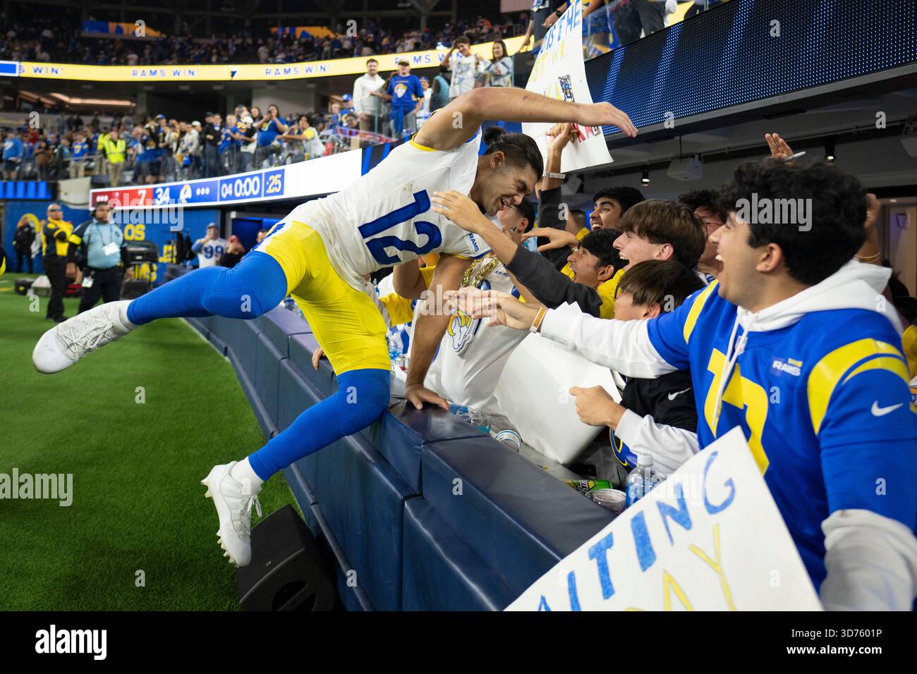 Los Angeles Rams wide receiver Puka Nacua (12) jumps towards the fans ...
