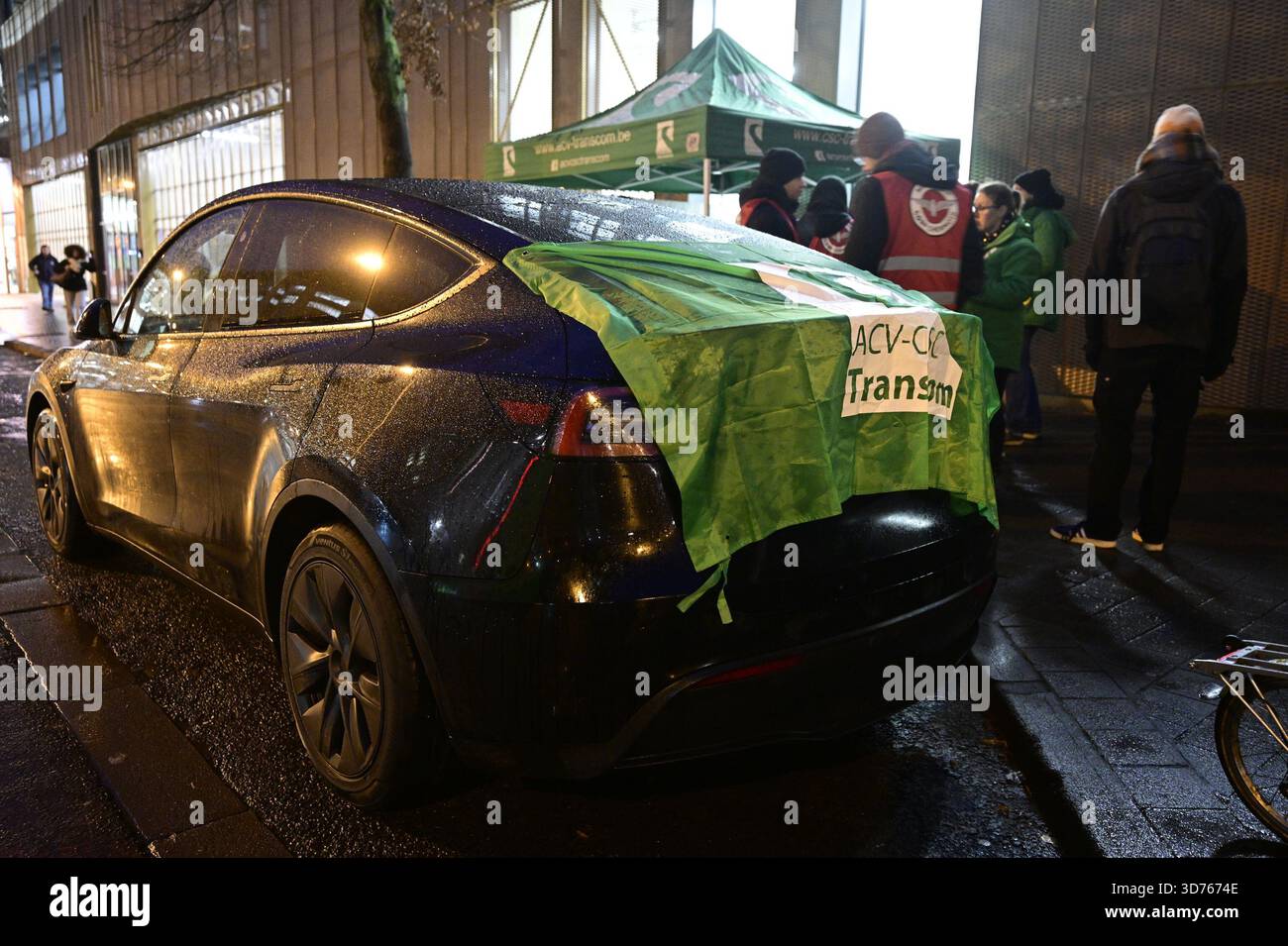 A flag of ACV - CSC union transcom pictured ahead of a symbolic march ...