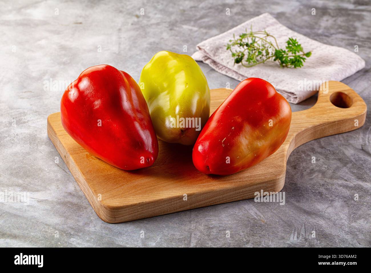 Ripe Bulgarian bell pepper over board Stock Photo - Alamy