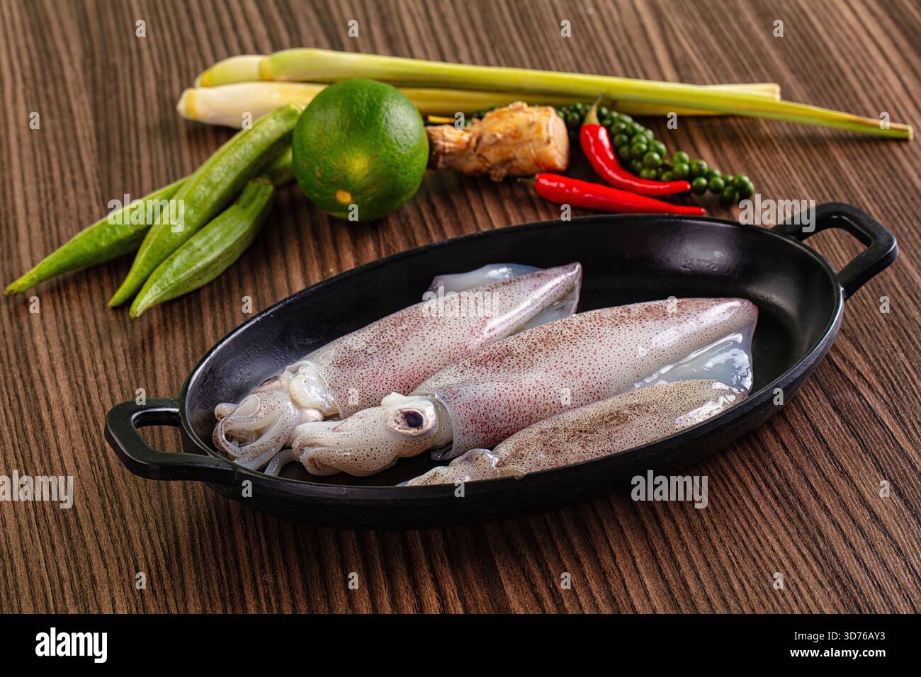 Raw wild fresh calamari for cooking Stock Photo - Alamy