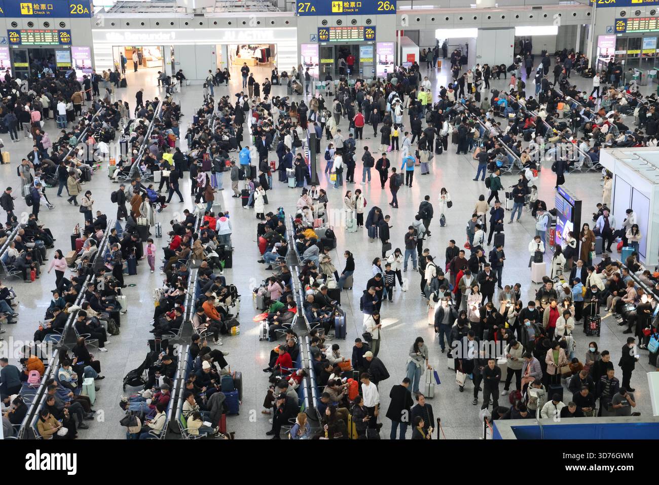 Passengers are seen at the waiting hall of Shanghai Hongqiao Railway ...