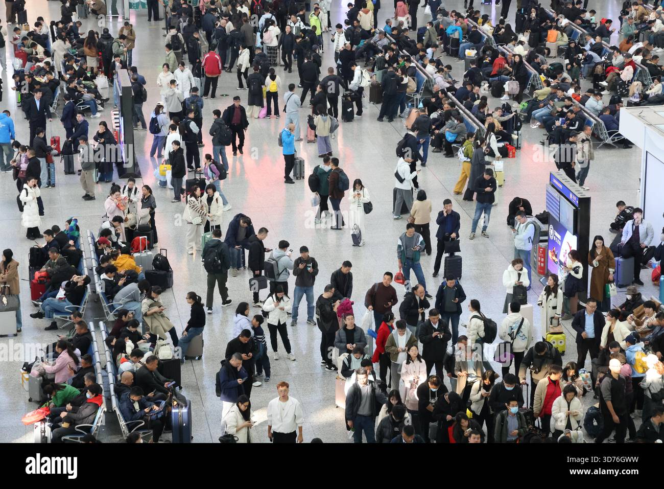 Passengers are seen at the waiting hall of Shanghai Hongqiao Railway ...