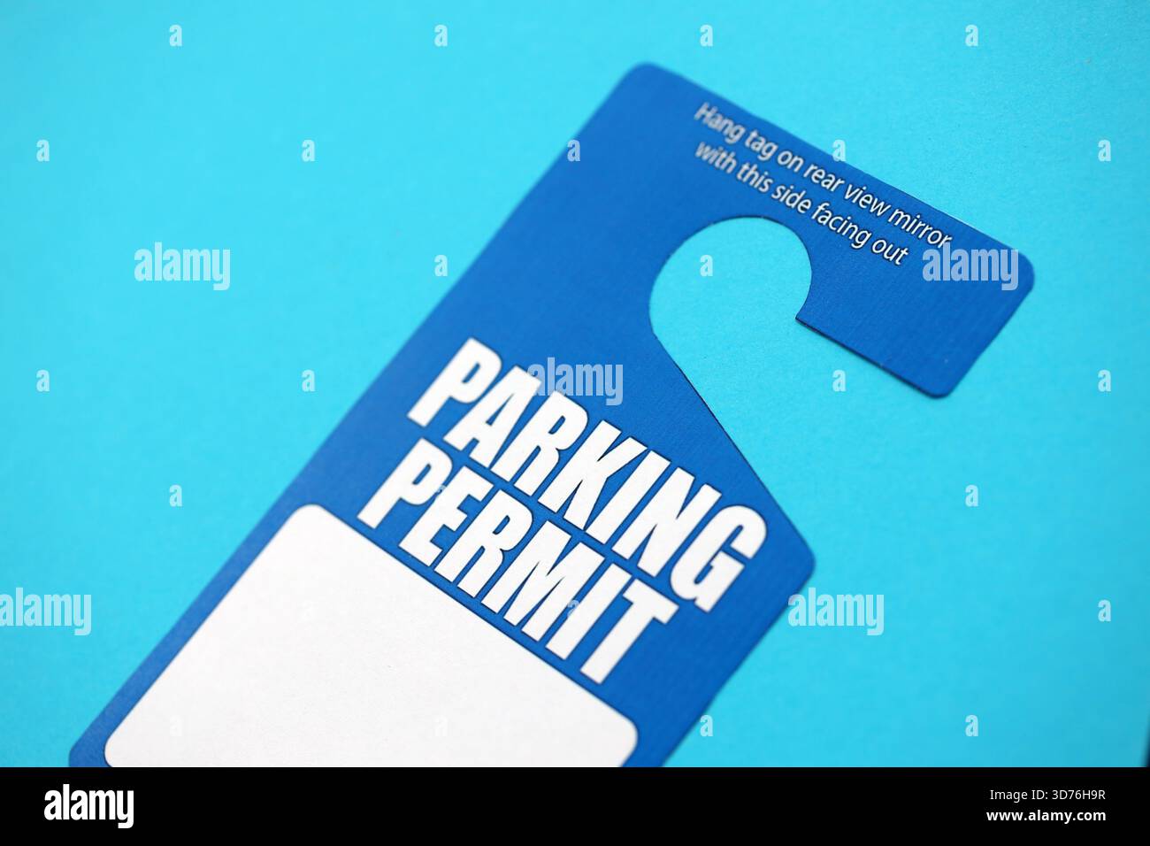 Parking permit paper notice tag for car interior close up. Parking ...