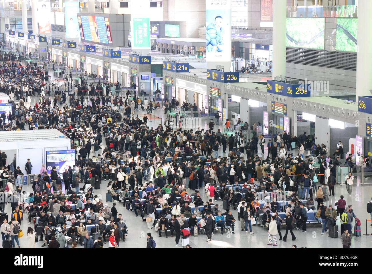 Passengers are seen at the waiting hall of Shanghai Hongqiao Railway ...