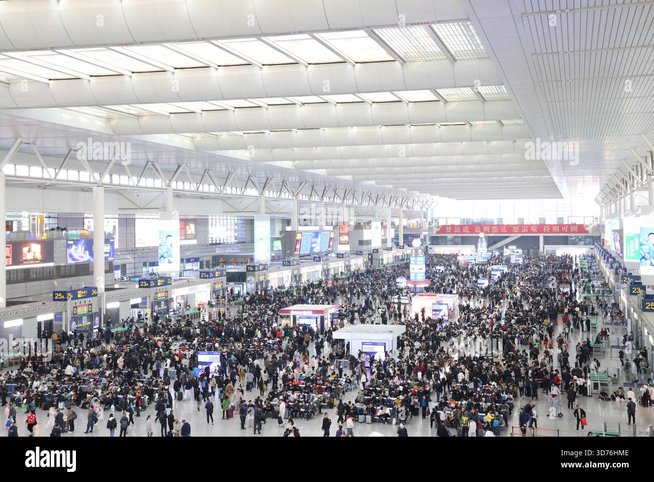 Passengers are seen at the waiting hall of Shanghai Hongqiao Railway ...