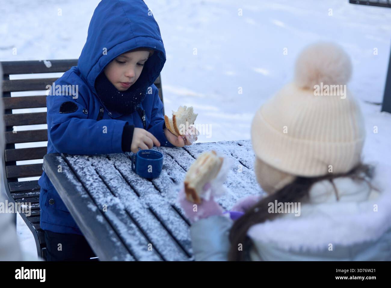 Two kids sharing lunch hi-res stock photography and images - Alamy