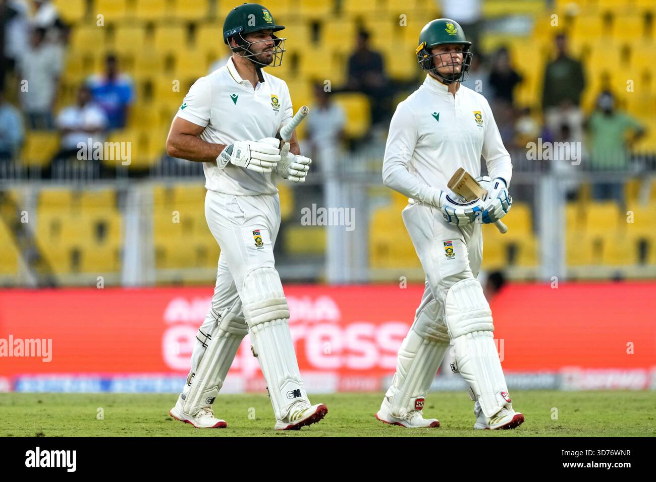 South Africa's Aiden Markram and South Africa's Ryan Rickelton walk off ...