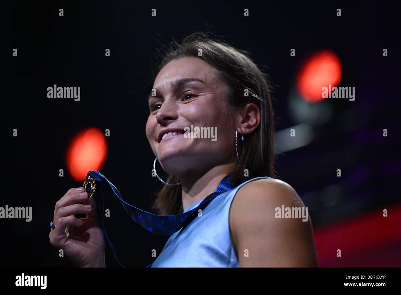 Ash Riddell of North Melbourne reacts after wining the best and fairest award during the 2025 ...