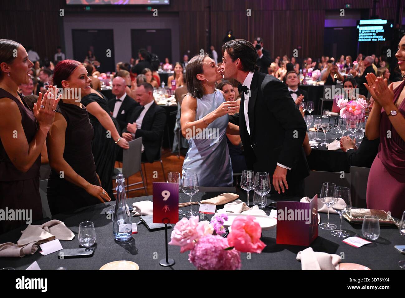 Ash Riddell of North Melbourne (centre) reacts after wining the best ...