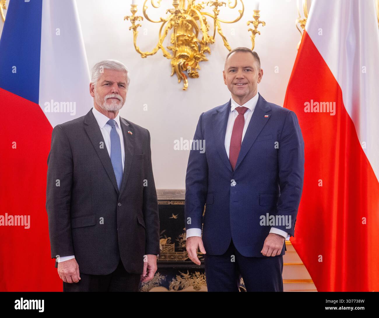 Czech President Petr Pavel, left, welcomes his Polish counterpart Karol ...