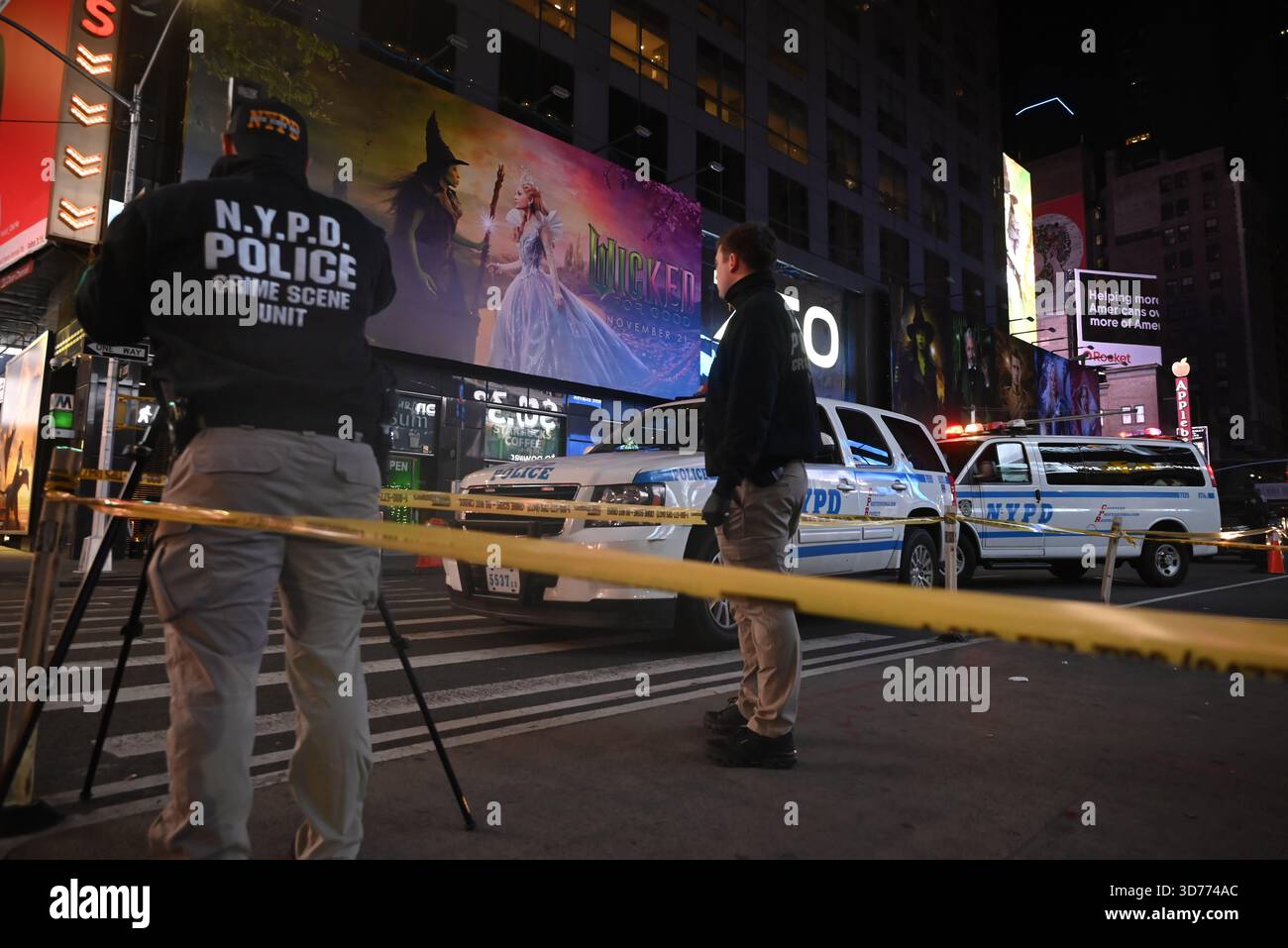 NYPD evidence technicians work the scene and collect evidence including ...