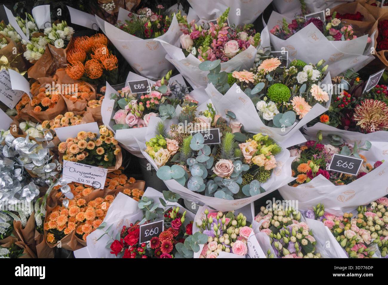 A variety of flowers displayed at a florist shop in Wimbledon, London ...