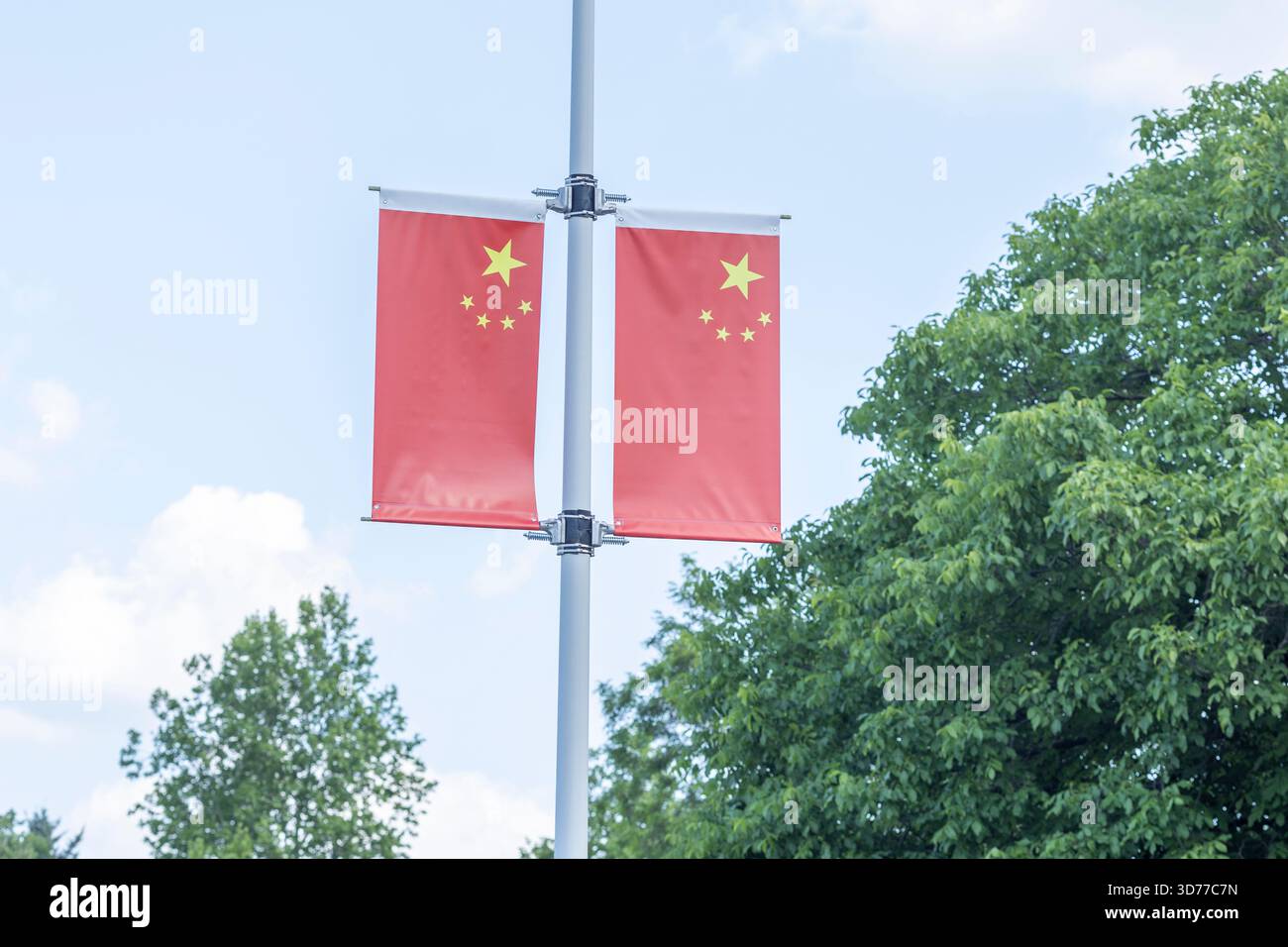 Chinese flag waving on pole hi-res stock photography and images - Alamy