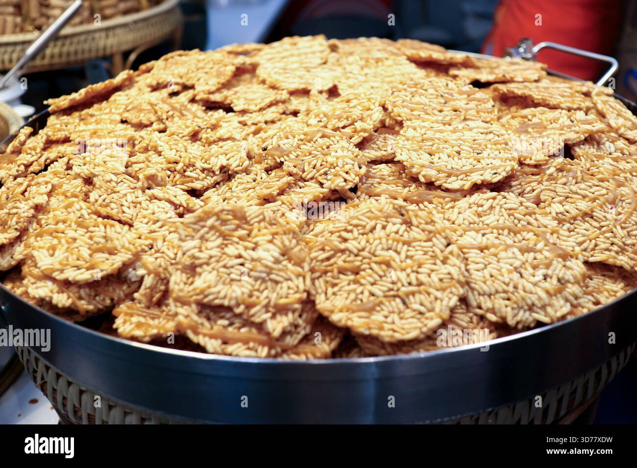 Nang Led Thai crispy rice cakes arranged in a tray, featuring puffed ...