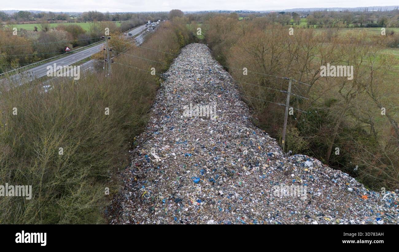 A general view of the 150m long pile of rubbish that has been illegally ...