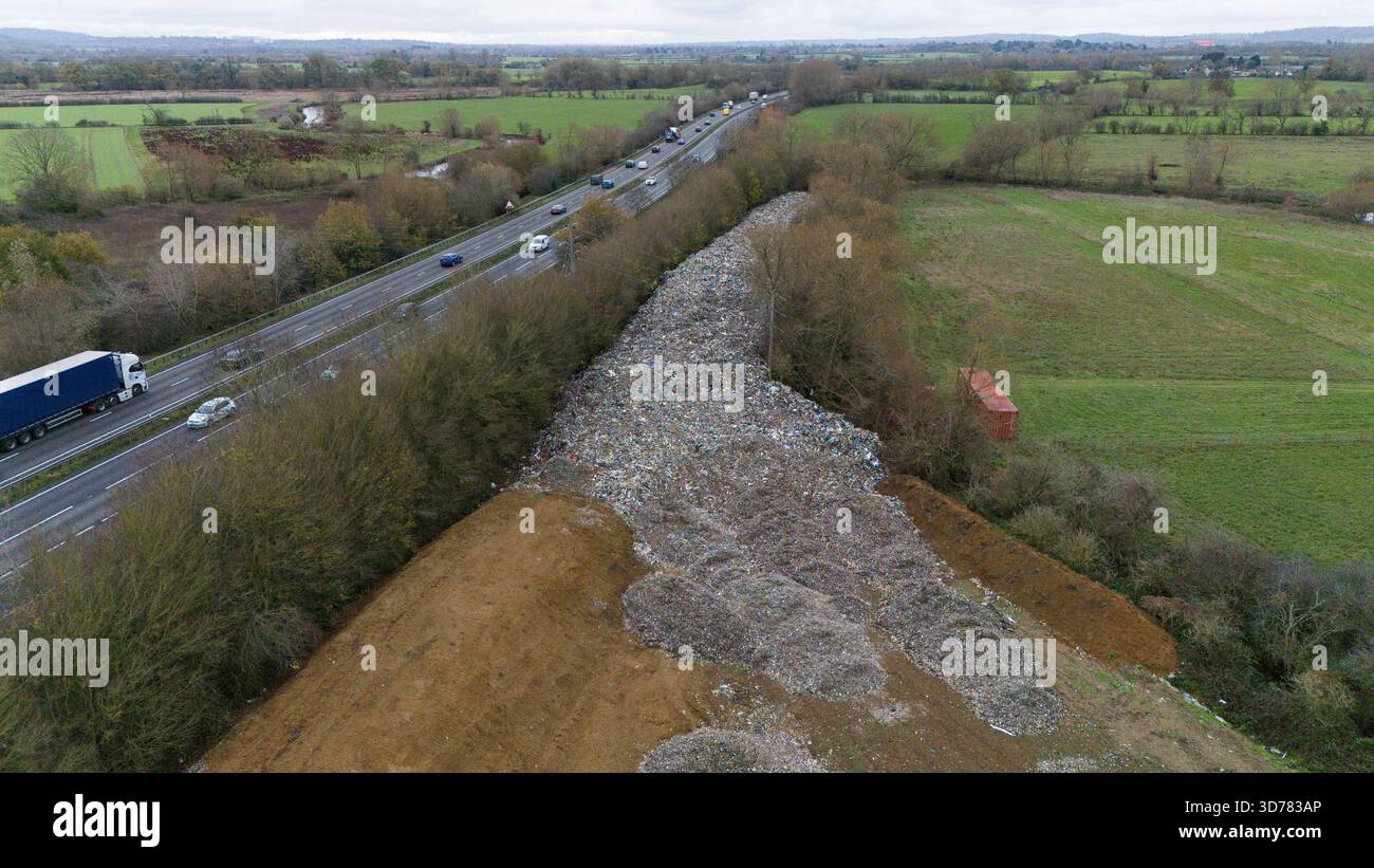 A general view of the 150m long pile of rubbish that has been illegally ...