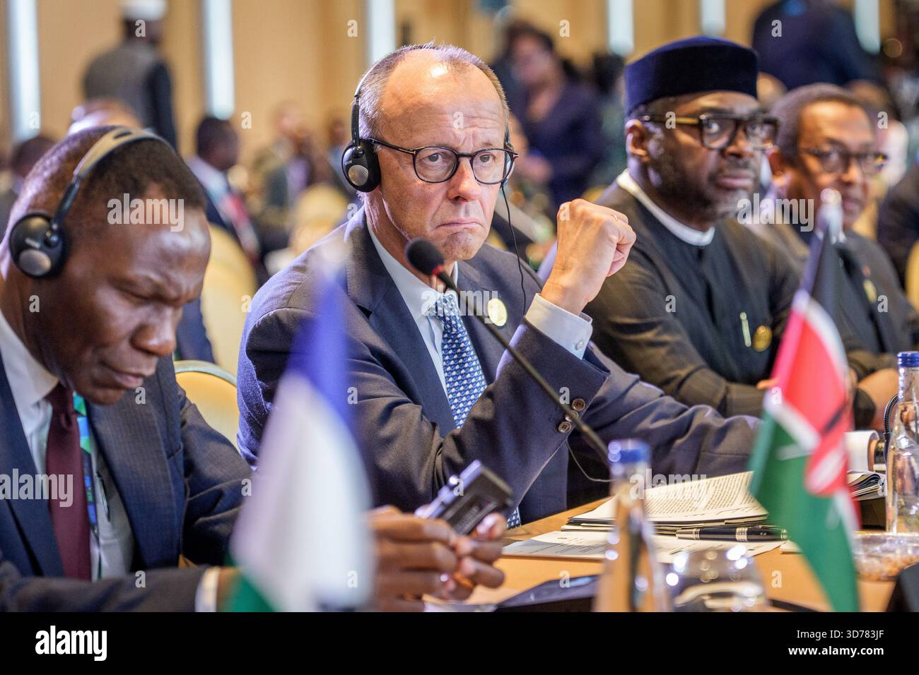 24 November 2025, Angola, Luanda: Federal Chancellor Friedrich Merz (CDU, M) takes part in the ...