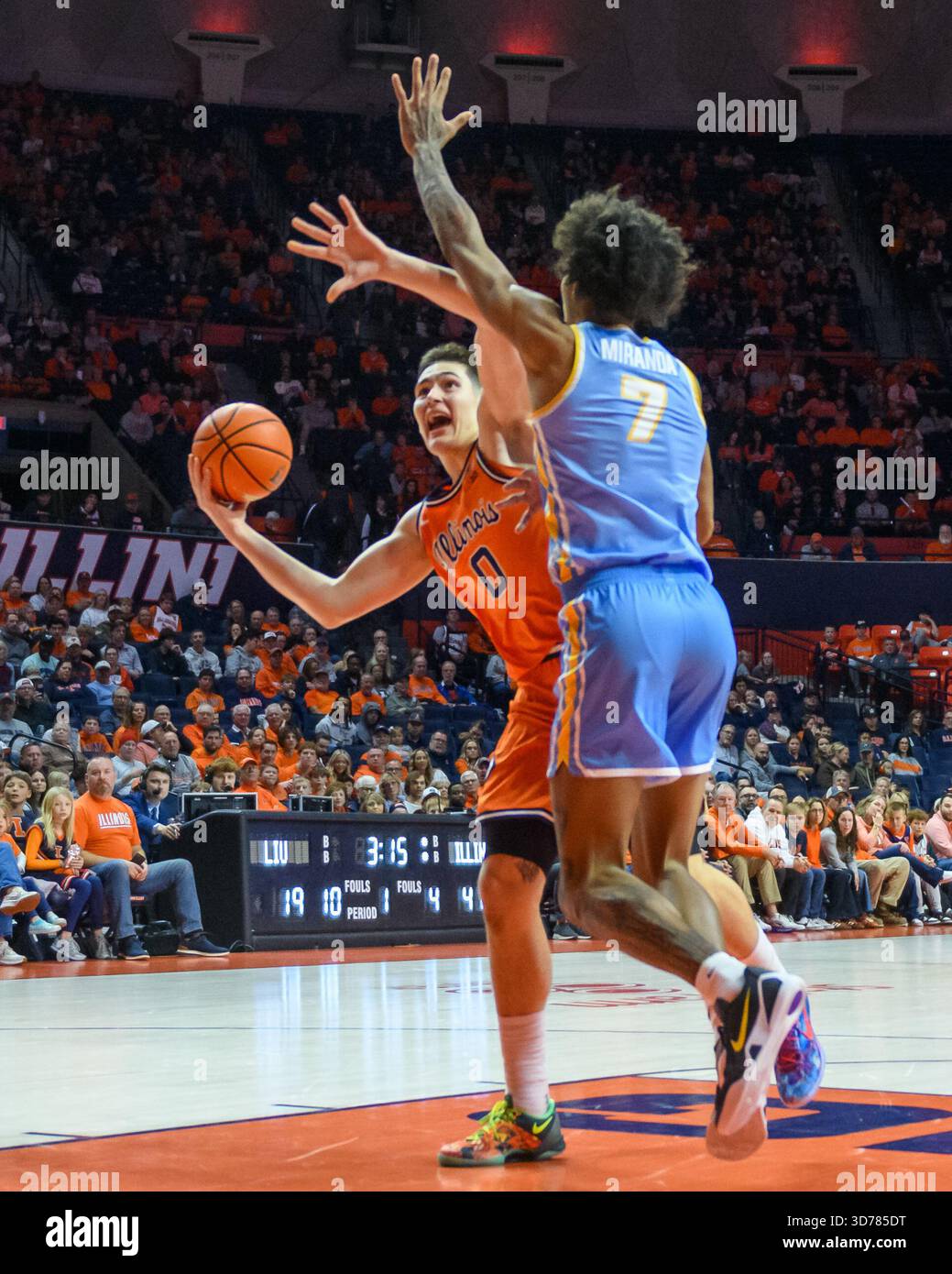 Illinois' David Mirkovic attempts to shoot as Long Island's Isaiah ...