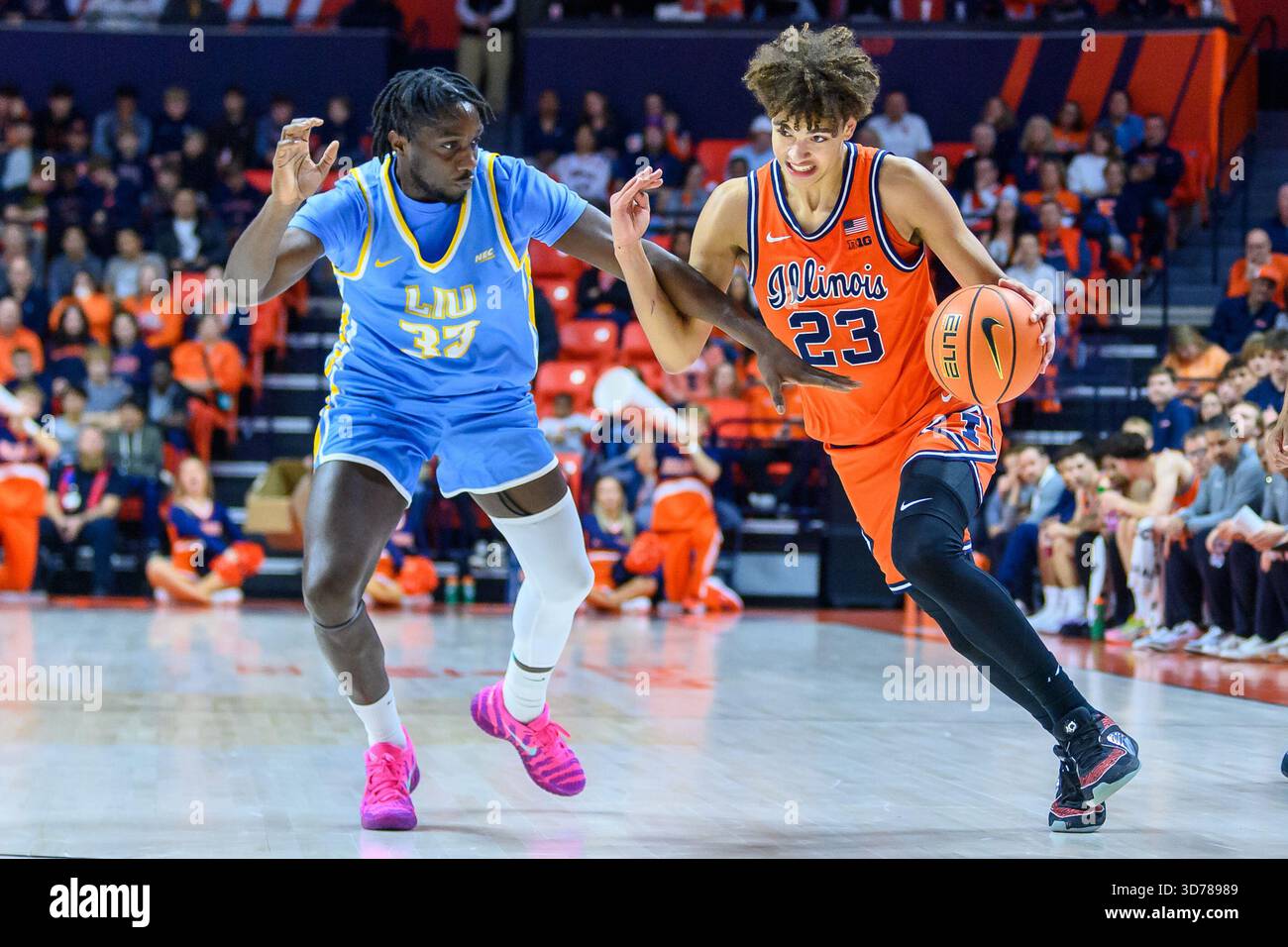 Long Island's Jamal Fuller attempts to stop Illinois' Keaton Wagler ...