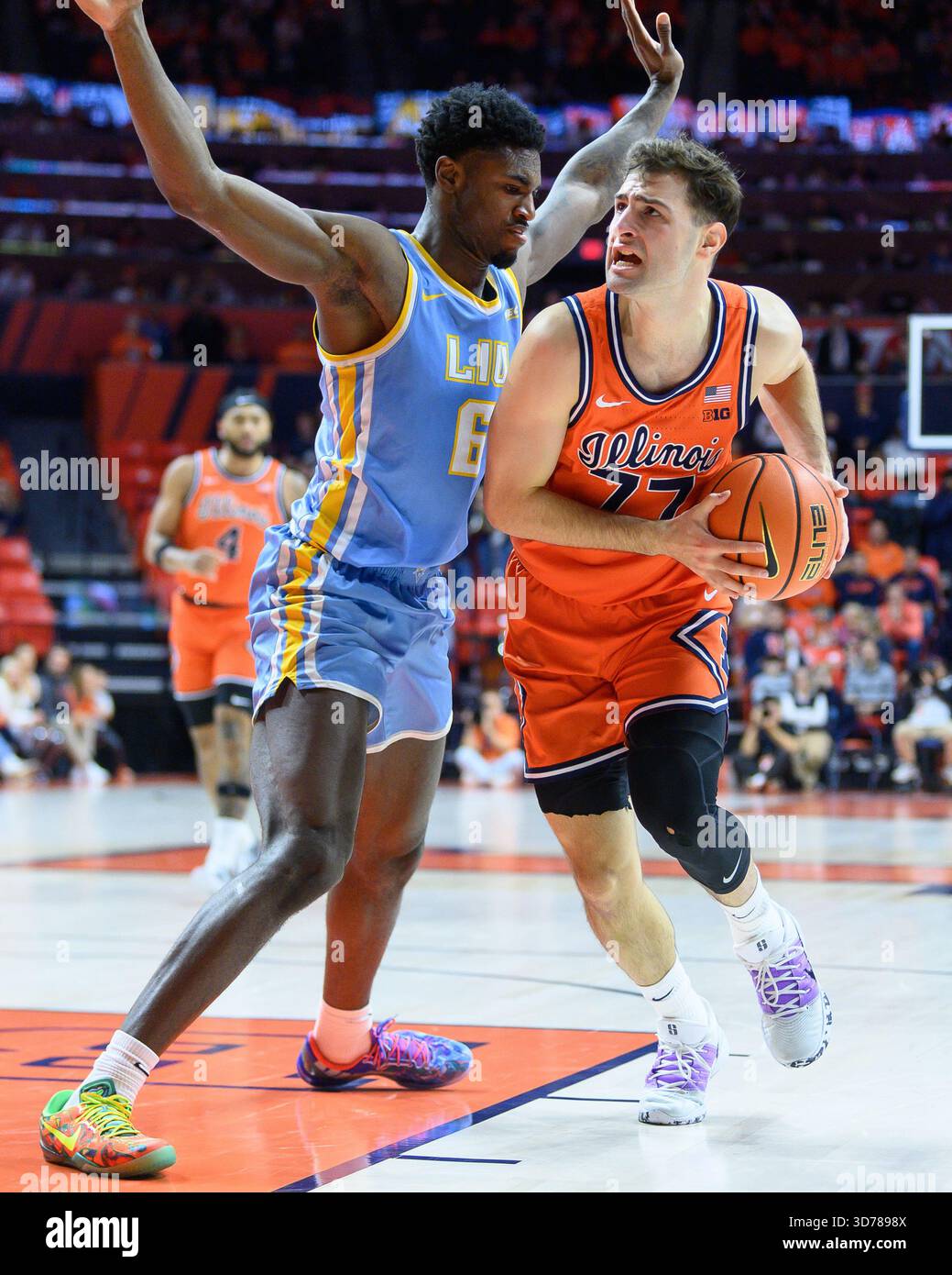 Illinois guard Mihailo Petrovic fights for position against Long Islanc ...