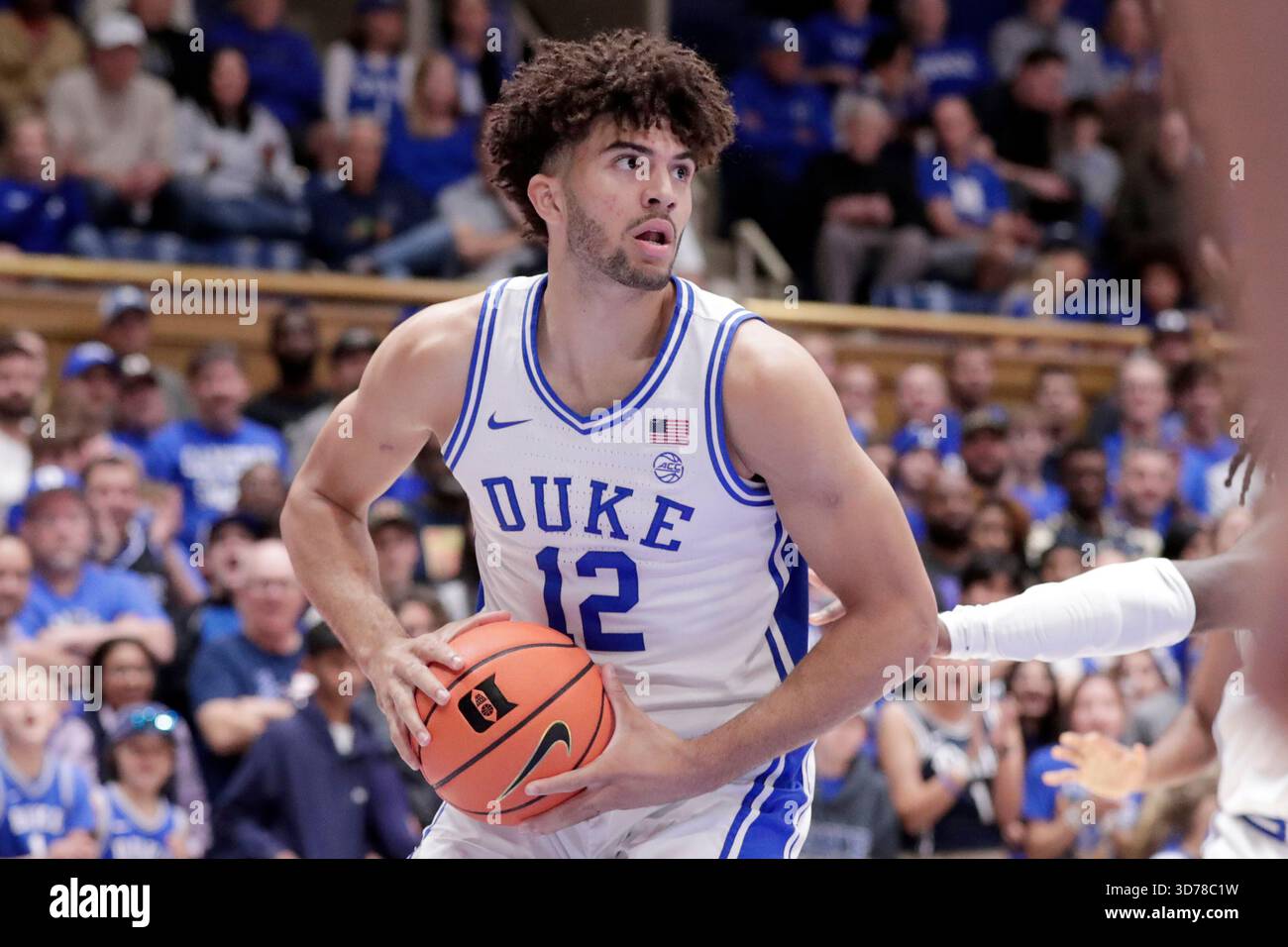Duke forward Cameron Boozer, left, controls a rebound against Howard ...
