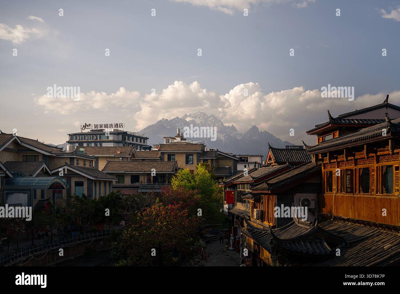 Lijiang, China - 21 November 2025: View of the old town's traditional ...