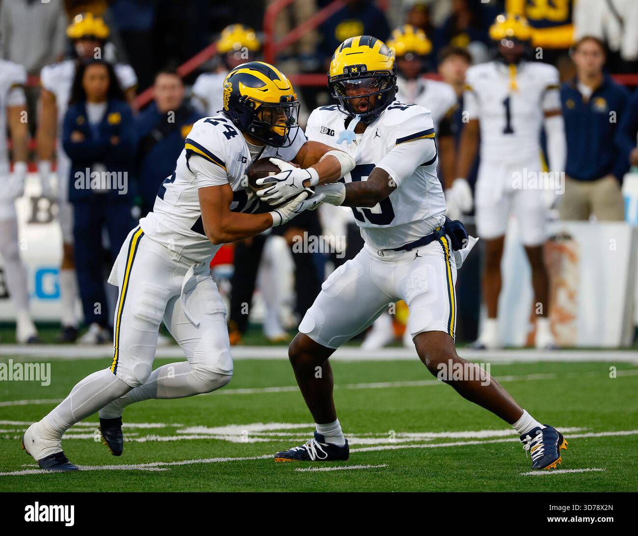 November 22, 2025: Michigan Wolverines QB #19 Bryce Underwood hands the ...