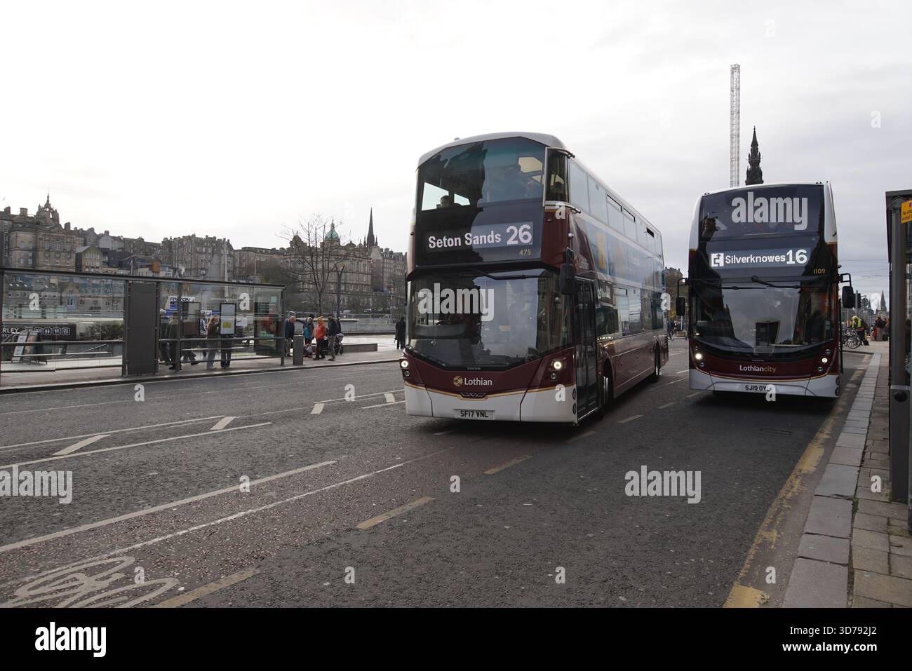 Two Lothian double-decker buses operating on routes 26 and 16 travel ...