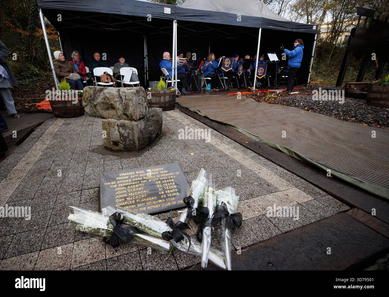 Flower’s laid at a memorial as St. Eugene's Brass and Reed Band Omagh ...