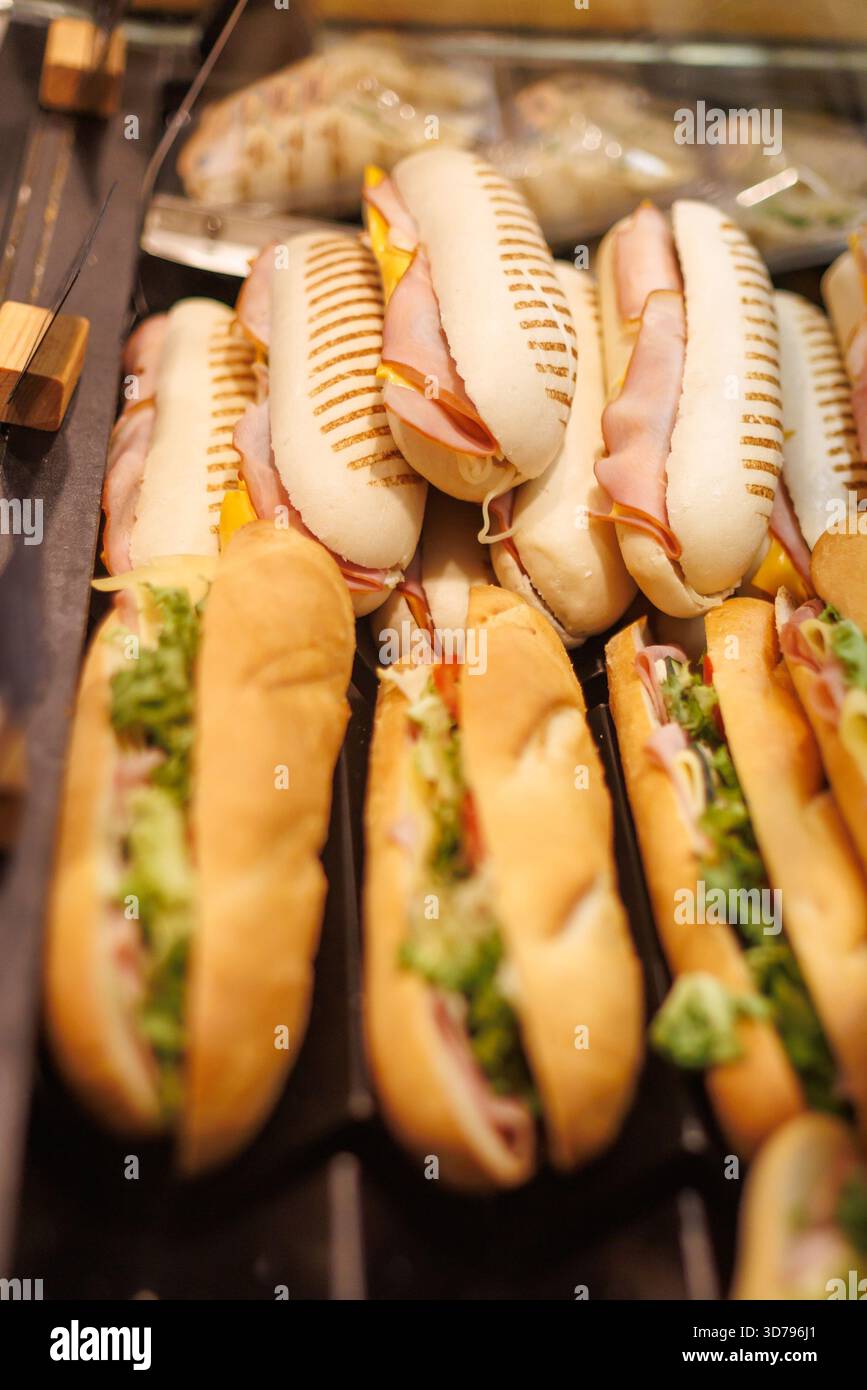 Delicious selection of freshly made sandwiches displayed in a food ...