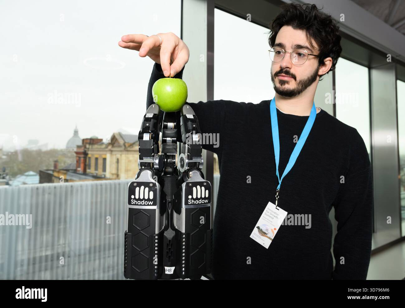 EDITORIAL USE ONLY Kacper Rozanski from Shadow Robot next to the DEX-EE ...