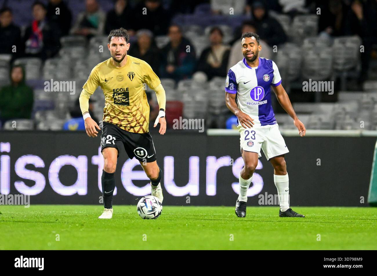 Jordan Lefort of SCO Angers and Cristian Casseres of Toulouse Football ...