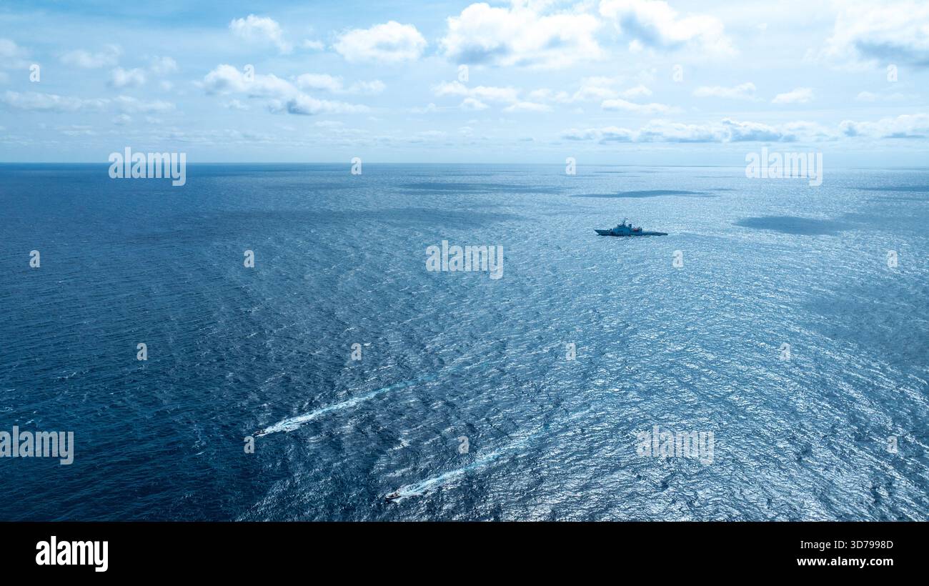 (251124) -- SOUTH CHINA SEA, Nov. 24, 2025 (Xinhua) -- An aerial drone ...