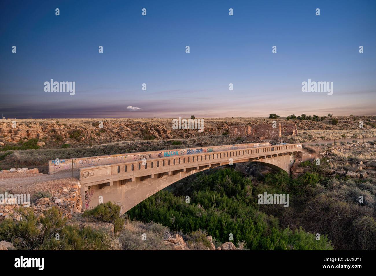 This is a dusk view of the US Route 66 closed spandrel arch bridge over ...