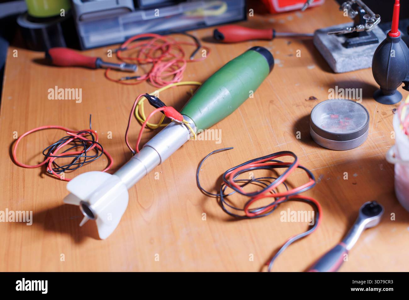 improvised explosive device being constructed on table from military ...