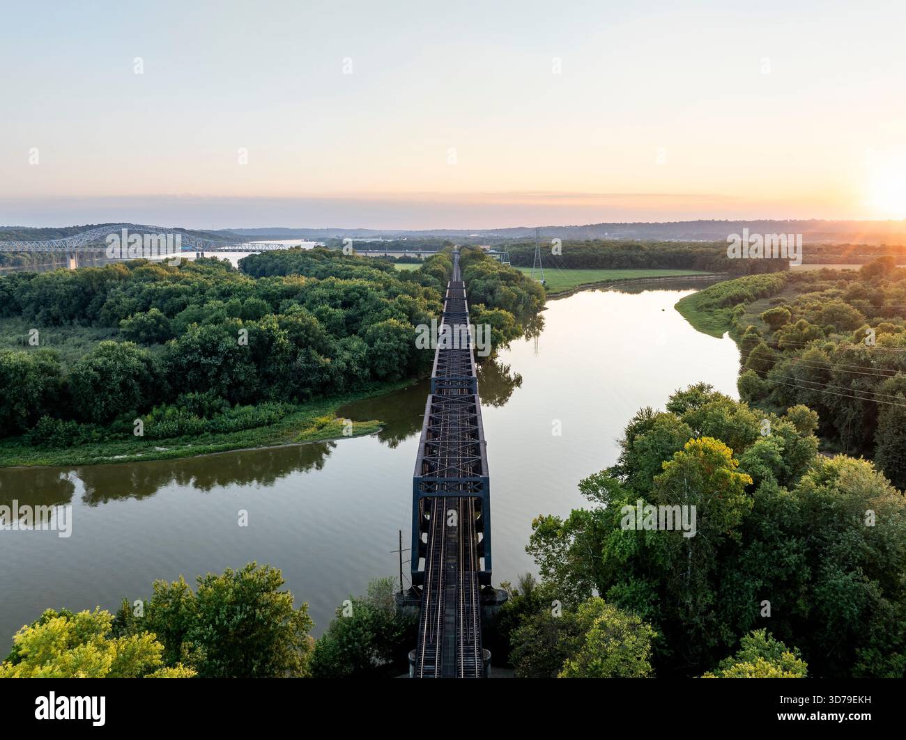 This is a sunset view of the Lawrenceburg Bridge, a through truss that ...