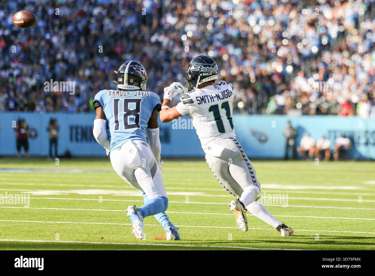Tennessee Titans cornerback Jalyn Armour-Davis (18) and Seattle ...