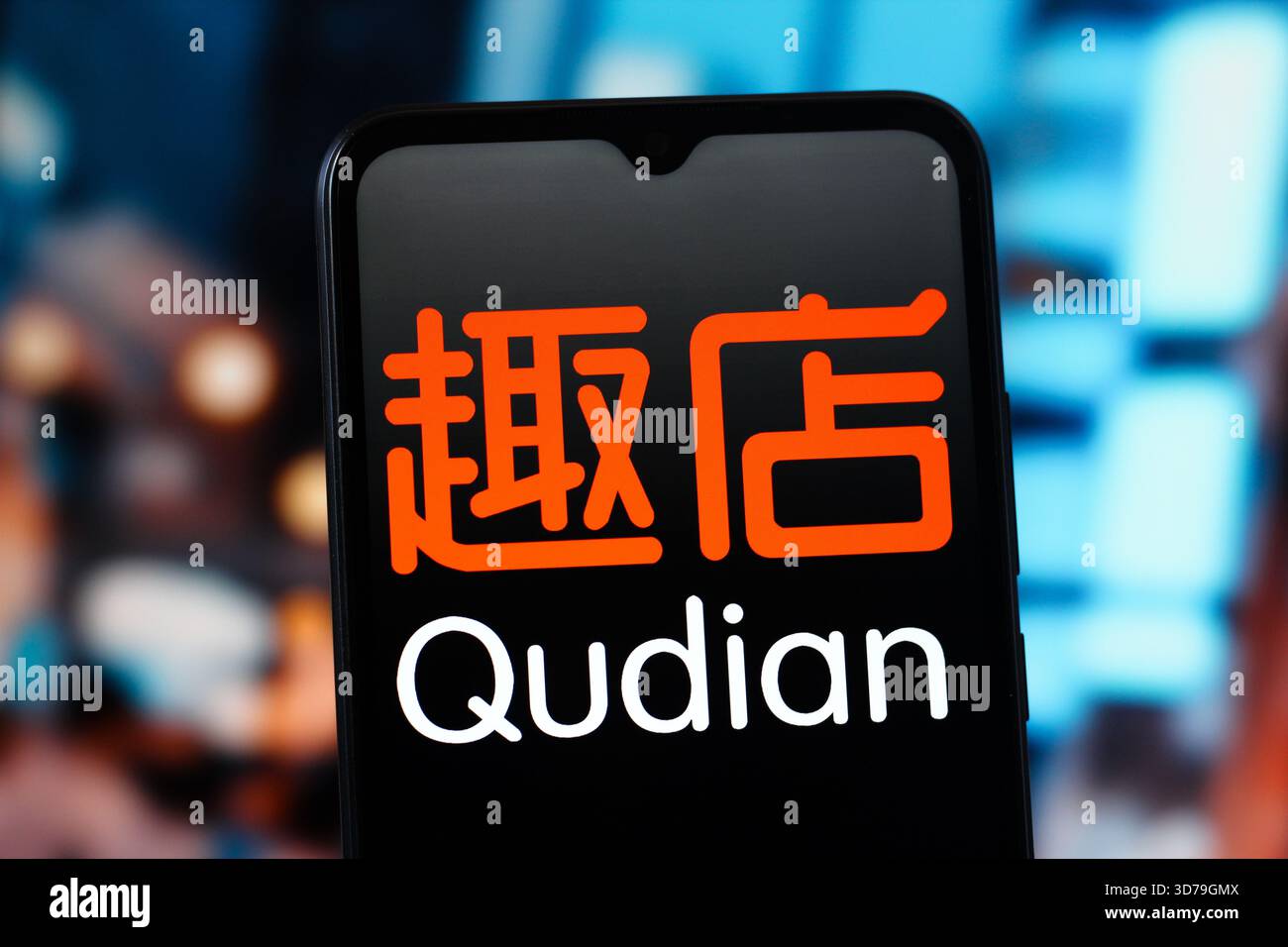 In this photo illustration, the Qudian logo is seen displayed on a ...