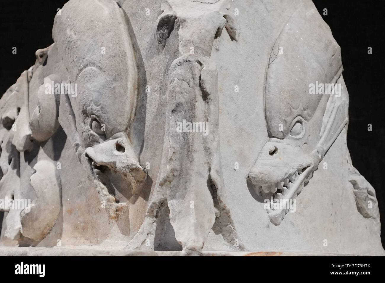 A fragment of a frieze from an architrave representing dolphins is ...