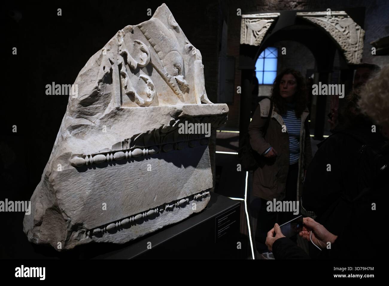 A fragment of a frieze from an architrave representing dolphins is ...