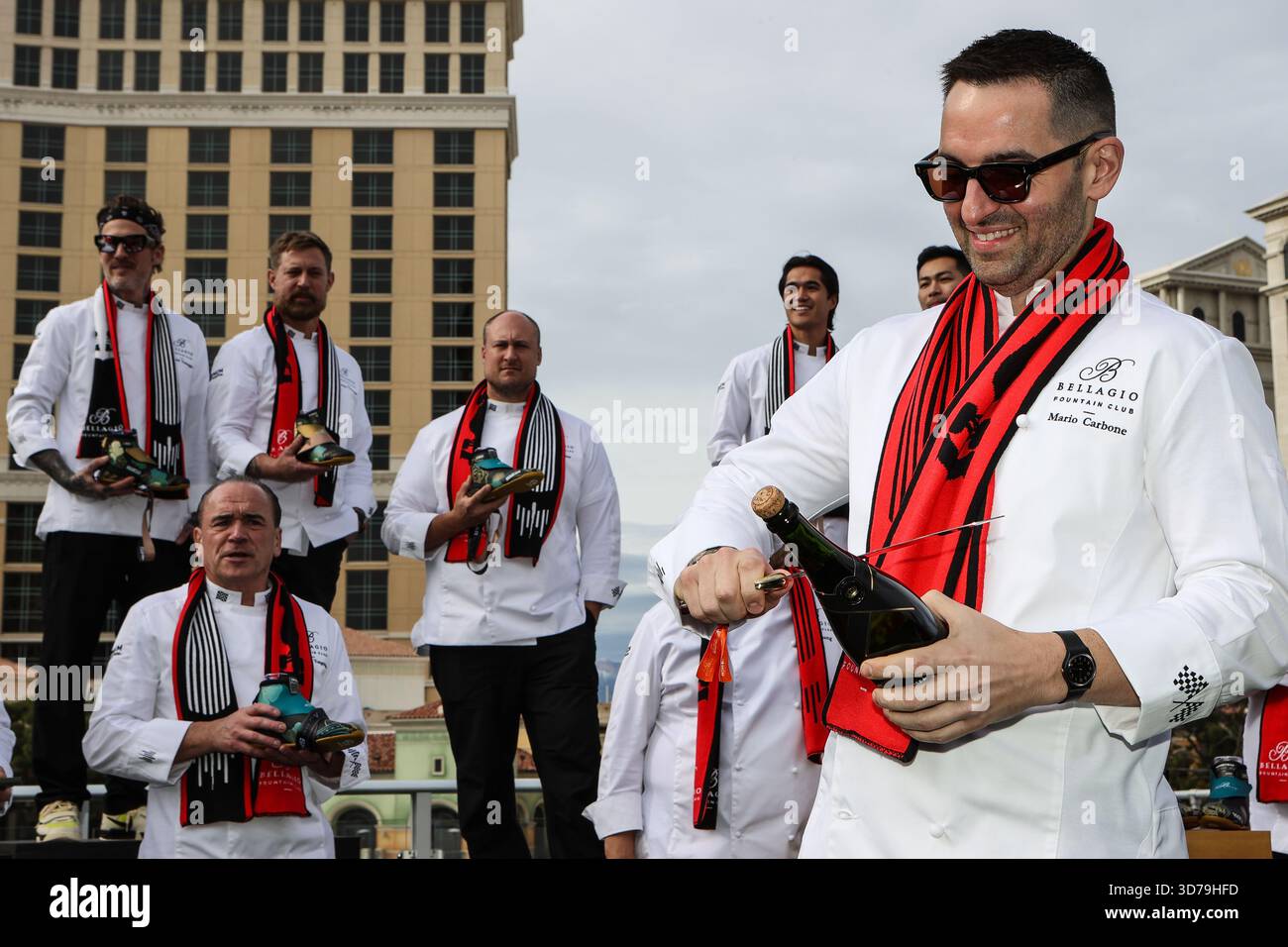 November 22, 2025: Chef Mario Carbone prepares to Saber a Bottle of ...