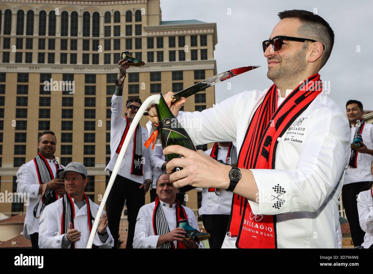 November 22, 2025: Chef Mario Carbone prepares to Saber a Bottle of ...