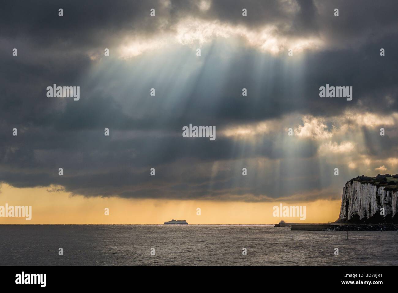 A DFDS cross-channel ferry approaching the port of Dover and the White ...