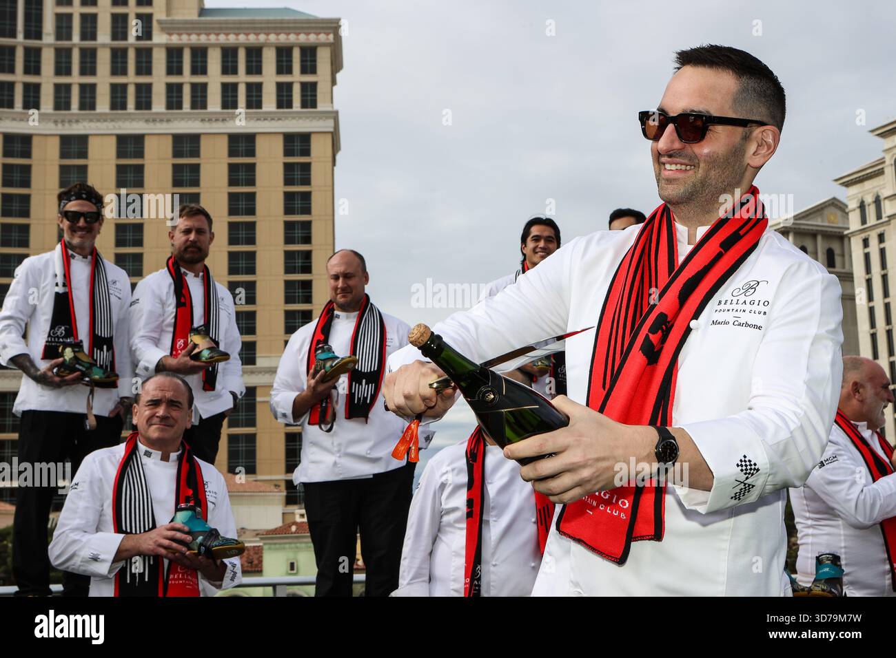 November 22, 2025: Chef Mario Carbone prepares to Saber a Bottle of ...