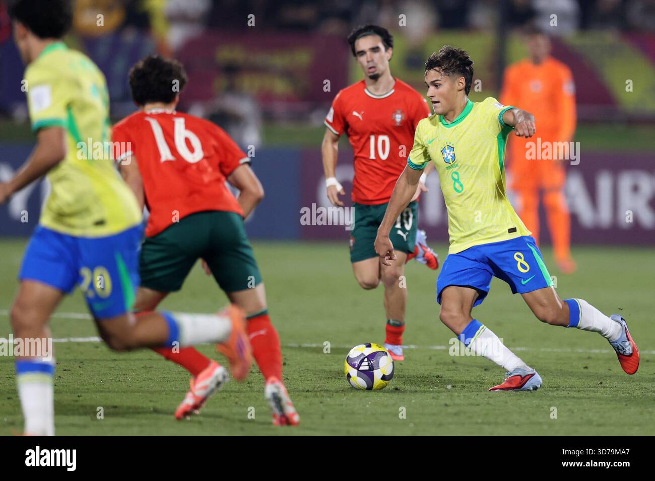 Brazil's Tiago fights for the ball against Portugal's Mateus Mide ...