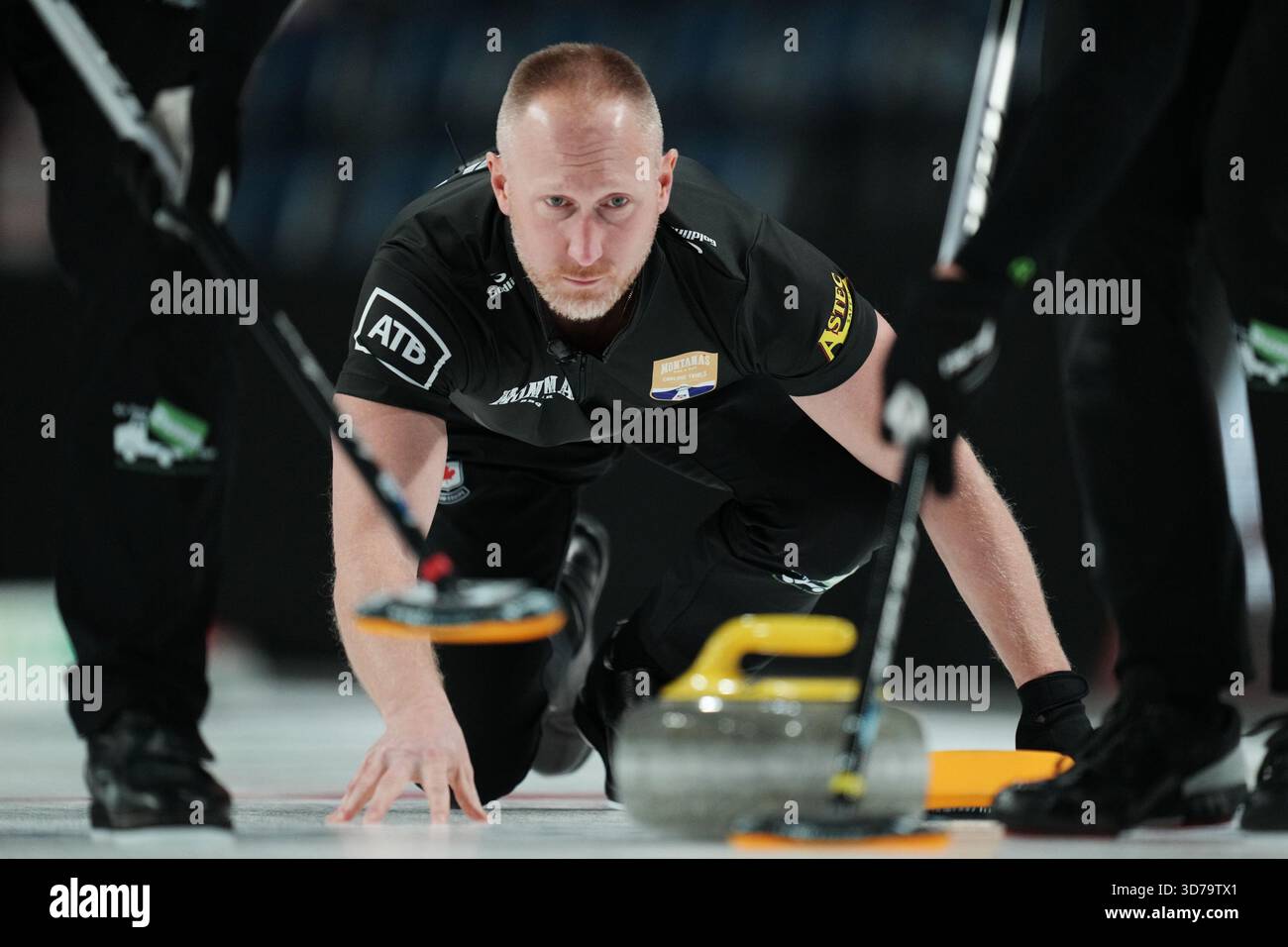 Brad Jacobs throws a rock during Canadian Olympic curling trials action ...